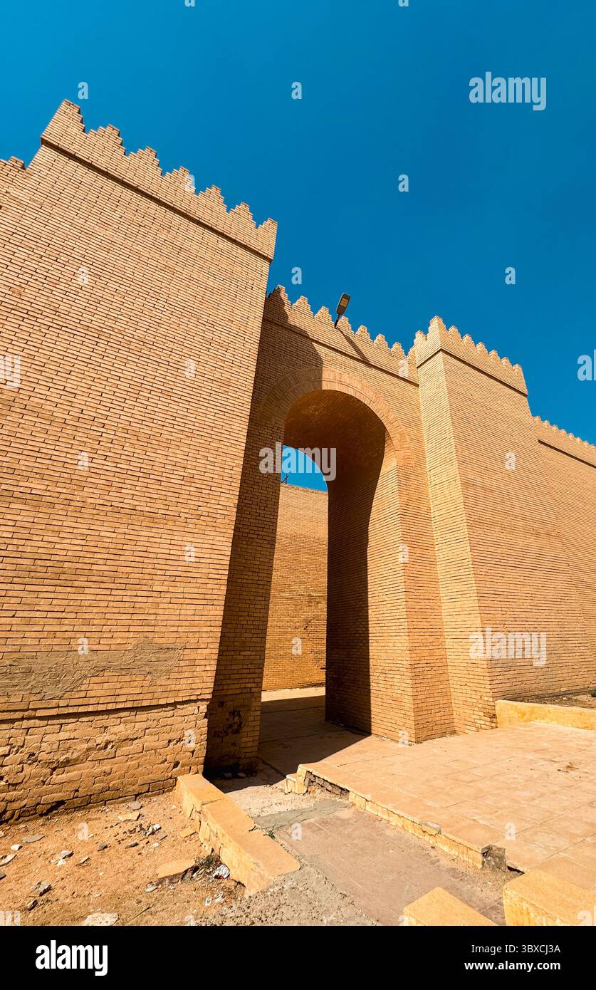 Visitors explore the ancient brick architecture of Babylon Iraq ...