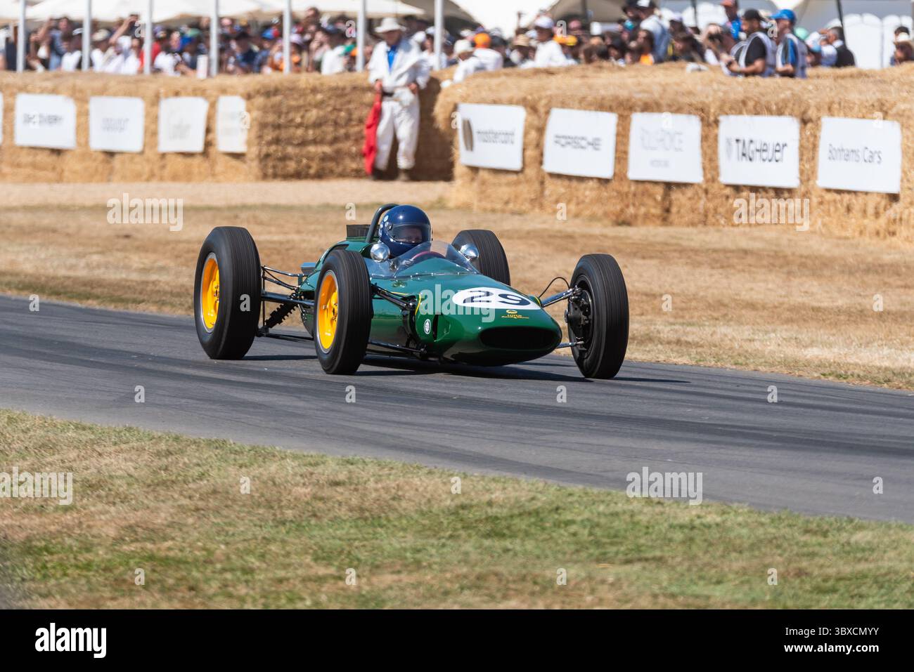 1962 Lotus 25 Grand Prix racing car driving up the hillclimb track at ...