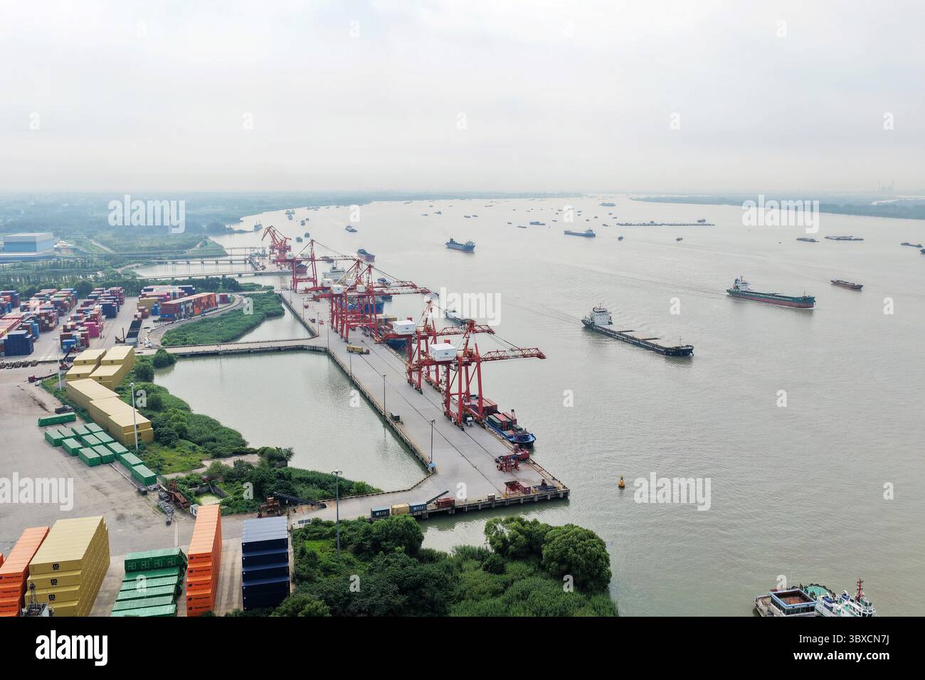 Aerial photo shows the busy container terminal at Yangzhou Port in ...