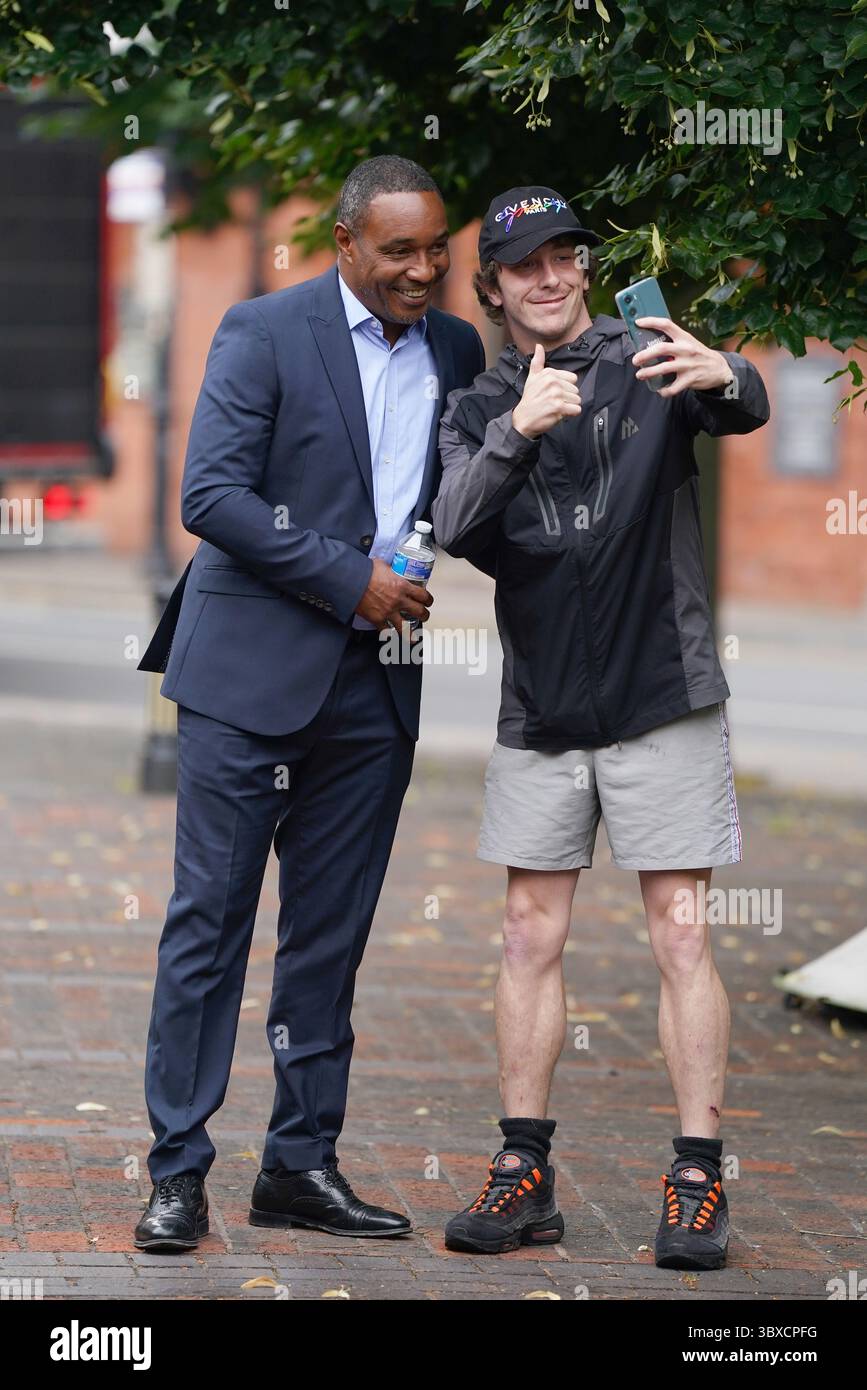 Former England captain Paul Ince has a selfie taken as he arrives at ...