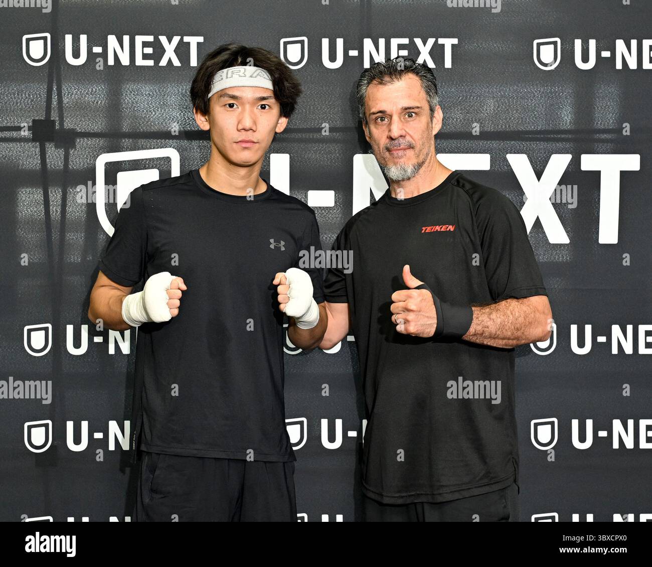 Kyosuke Takami of Japan and his trainer Augie Sanchez during a public workout in Tokyo, Japan on ...