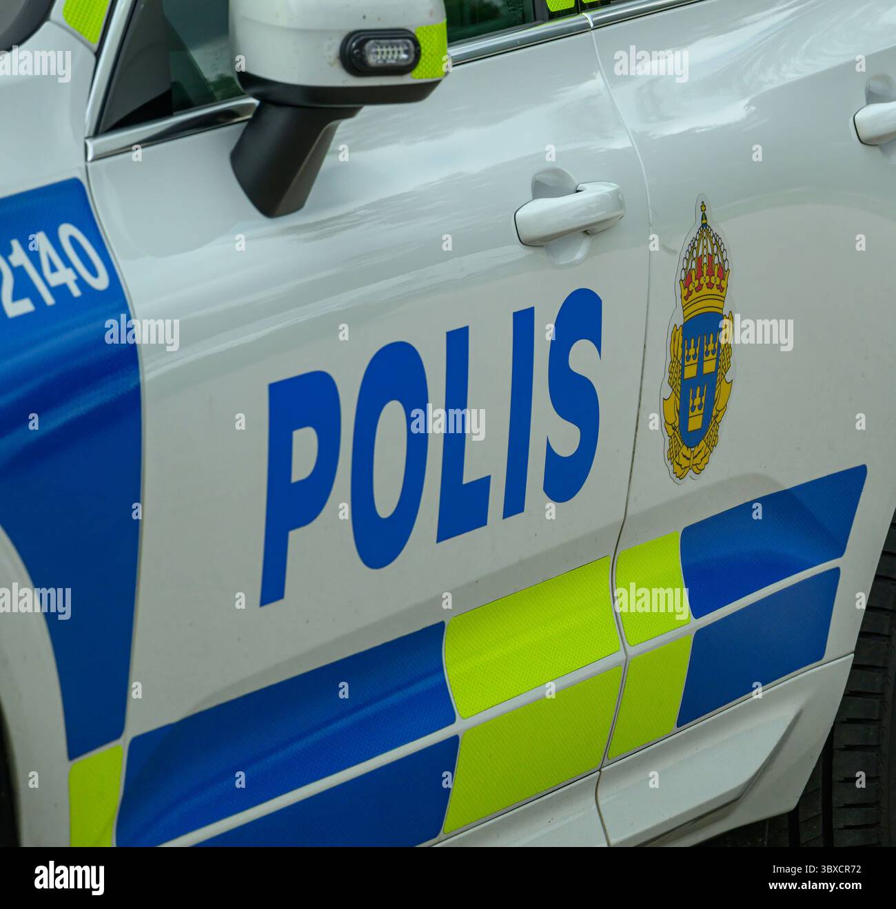 A distinctive police vehicle is parked on the street, showcasing its ...
