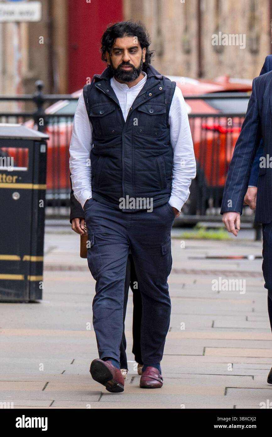 Omer Sheikh, who arrived along with his wife Attiya Sheikh, at Paisley ...
