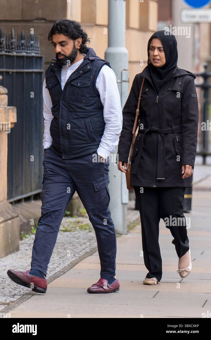 Attiya Sheikh (right) and her husband Omer Sheikh arrive at Paisley ...