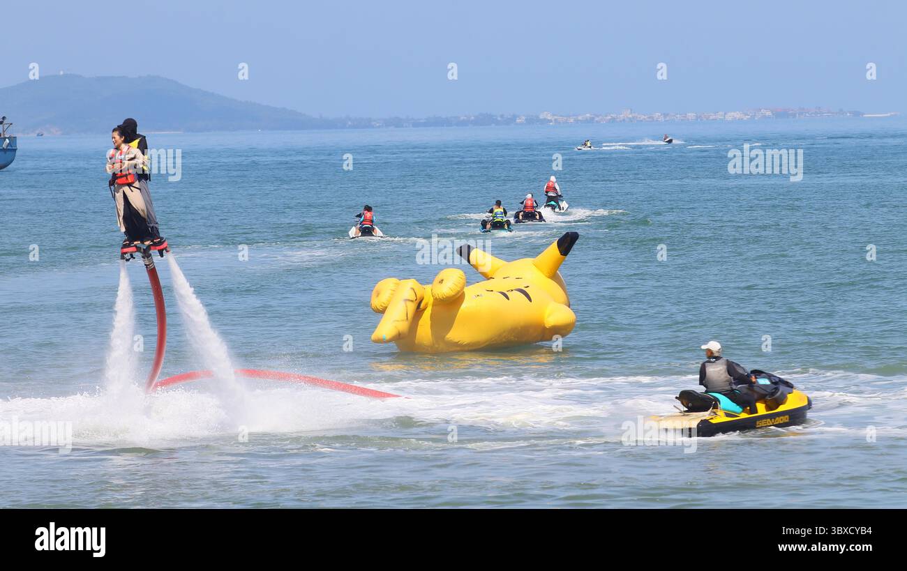 Tourists enjoy summer time in Sanya City, southernmost China's Hainan ...