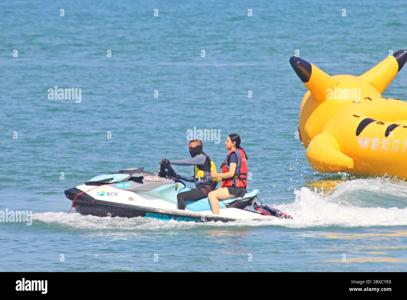 Tourists enjoy summer time in Sanya City, southernmost China's Hainan ...