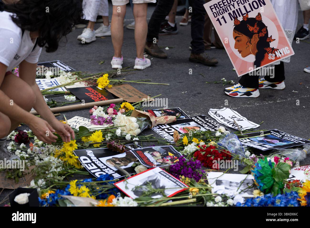 People lay flowers outside the immigration court at the Jacob K. Javitz ...