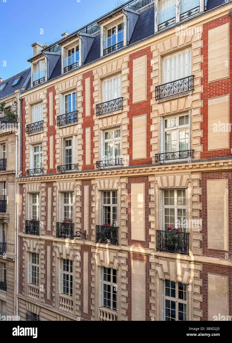 Traditional residential building with iron balconies in Paris, France ...