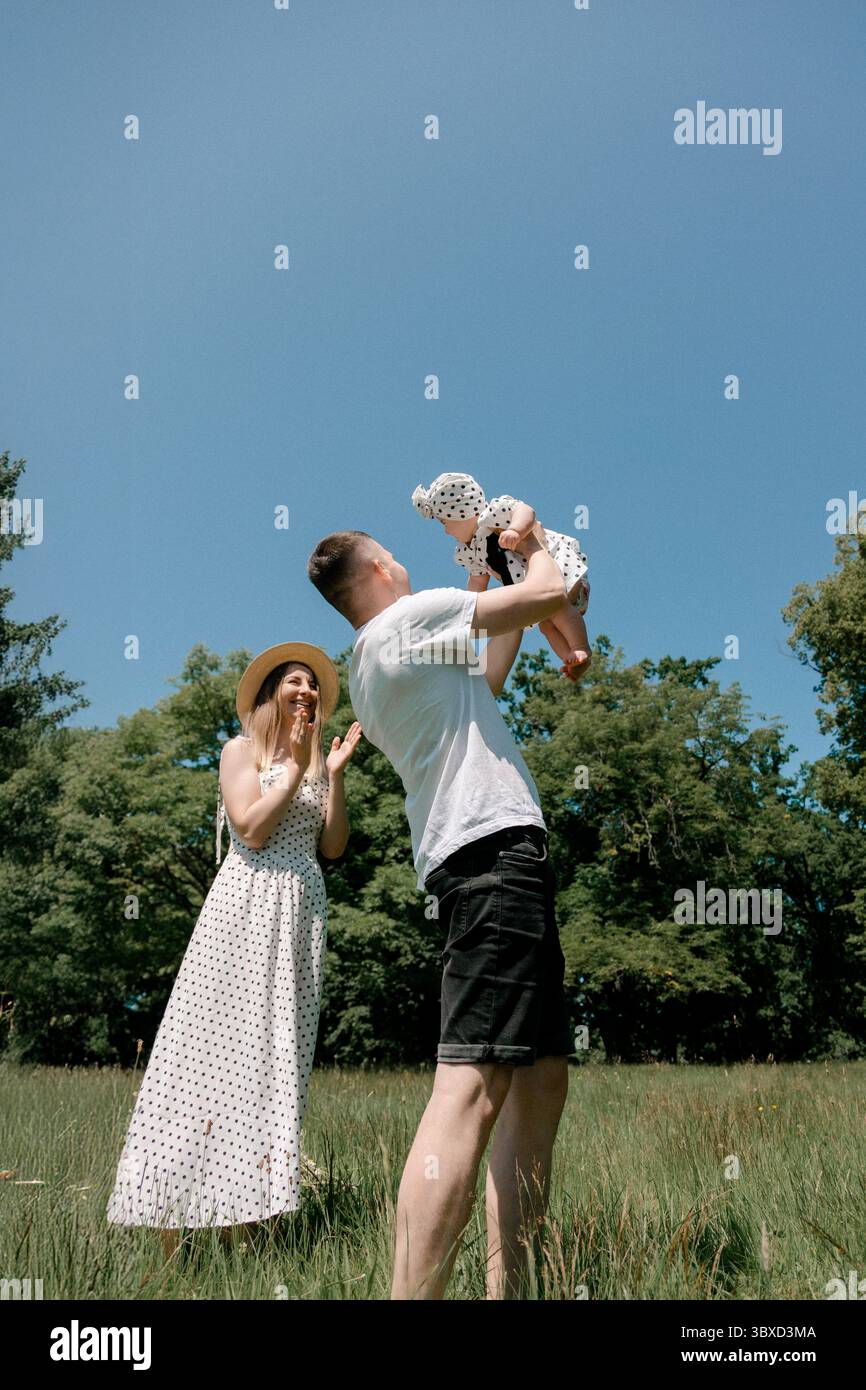 Father lifting baby in hi-res stock photography and images - Alamy