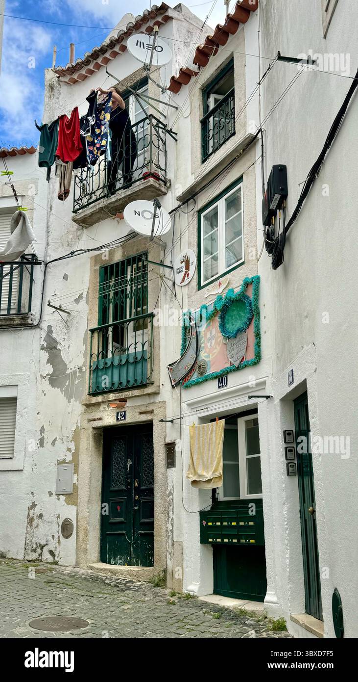 Washing hanging on clotheslines outside of residential buildings in ...