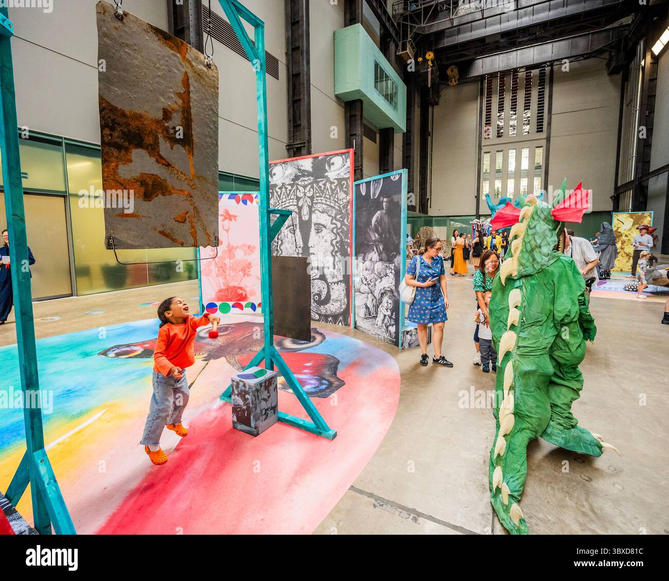 London, UK. 18 Jul 2025. A smoke breathing dragon 'slowly' chases the ...