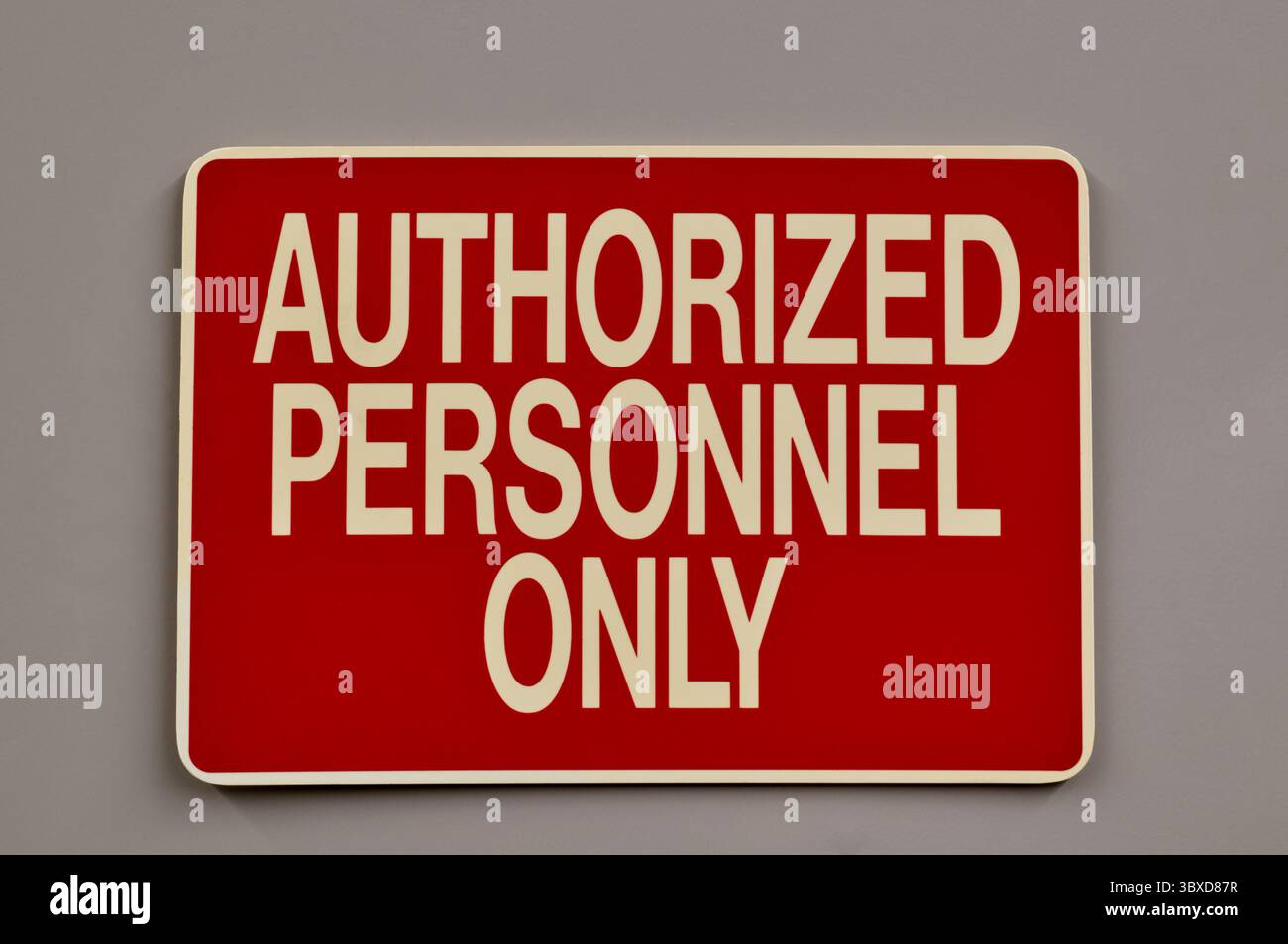Authorized Personnel Only safety sign warning notice on wall industrial ...