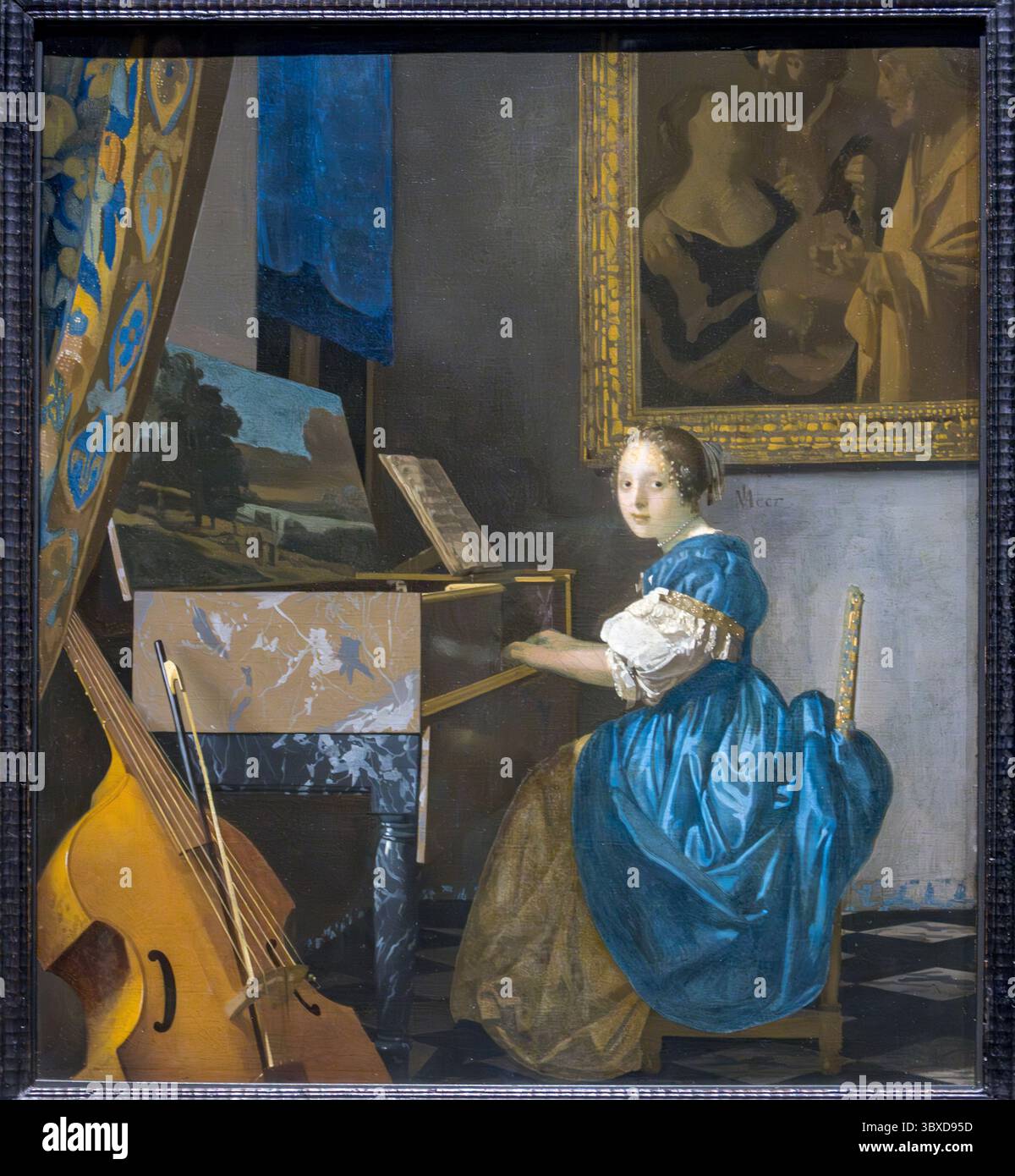 A Young Woman seated at a Virginal, oil painting by Johannes Vermeer ...