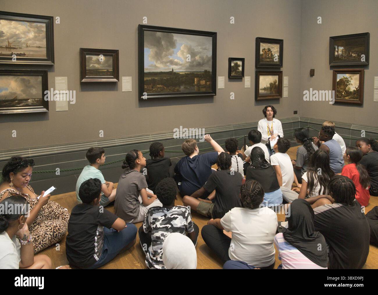 tour leader with schoolchildren in field trip, National Gallery, London, UK Stock Photo - Alamy