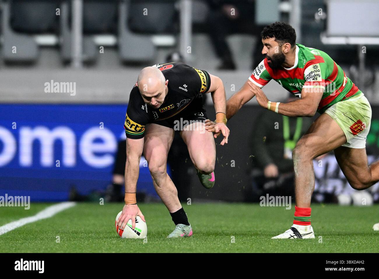 Dylan Edwards of the Panthers runs in to score during the NRL Round 20 ...
