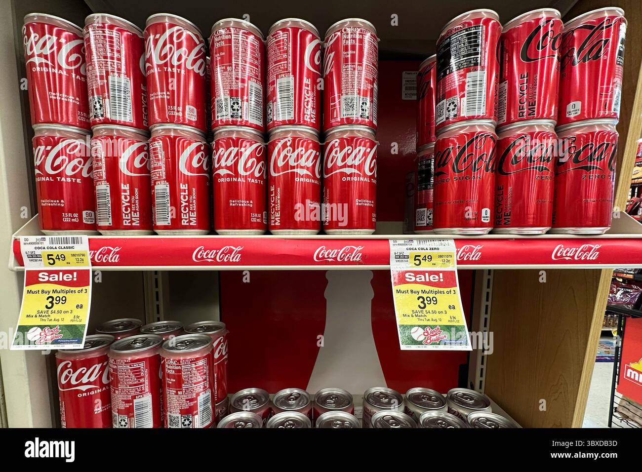Coca-Cola cans are displayed at a grocery store in Mount Prospect, Ill ...