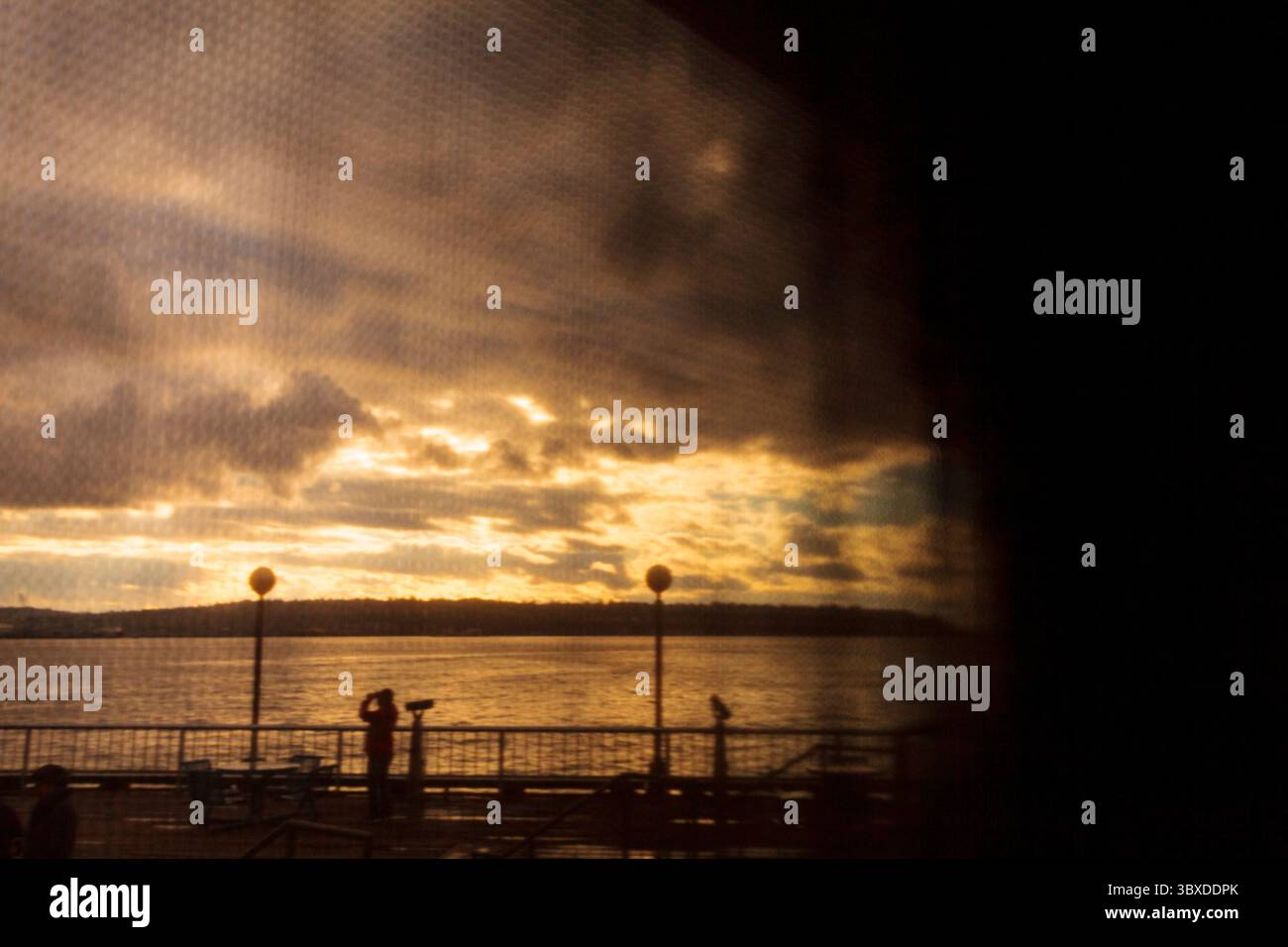 Seattle waterfront, view through window shade Stock Photo - Alamy
