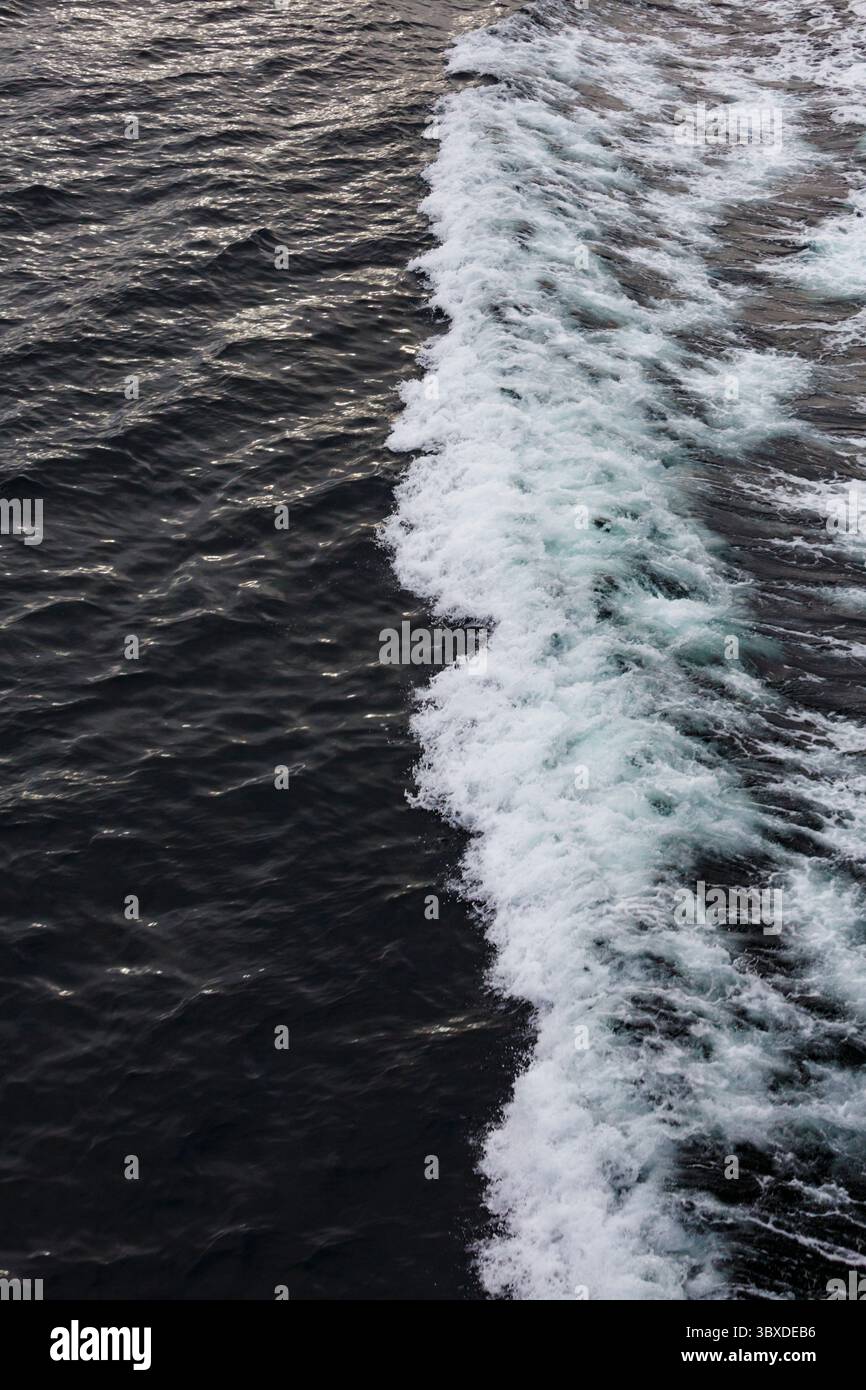 Puget Sound ferry wake, white water trail behind the boat, elevated ...