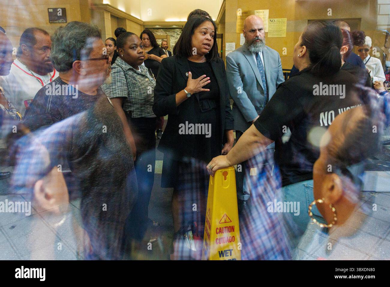 Karima Yelverton, Assistant District Attorney speaks with family of ...
