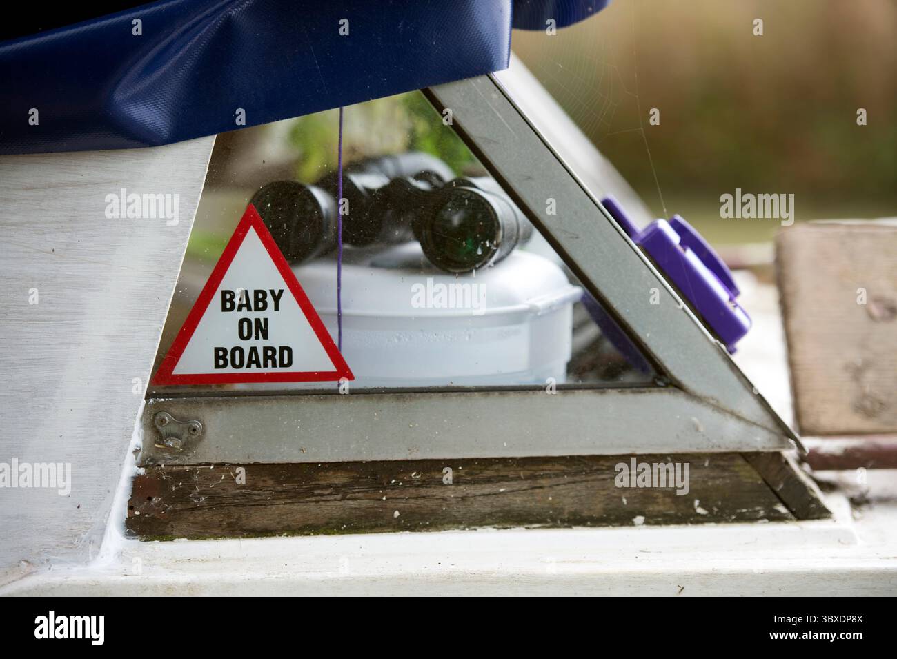 A 'Baby on Board' sticker on a narrowboat at the Sells Green stretch of ...