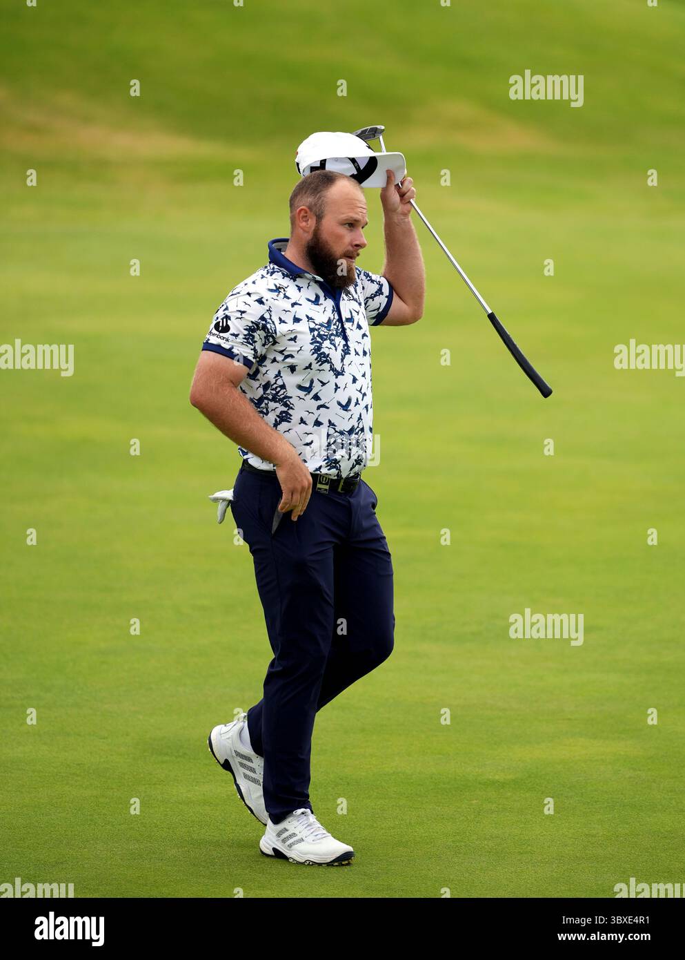 England's Tyrrell Hatton on the 18th green on day two of The 153rd Open ...
