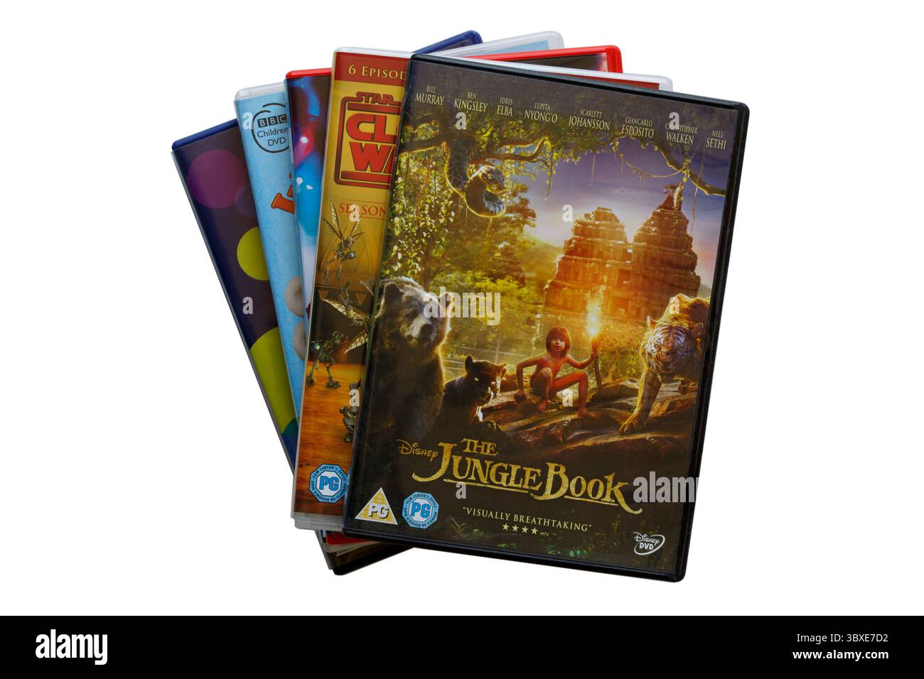 pile of DVDs with Disney The Jungle Book DVD on top isolated on white ...