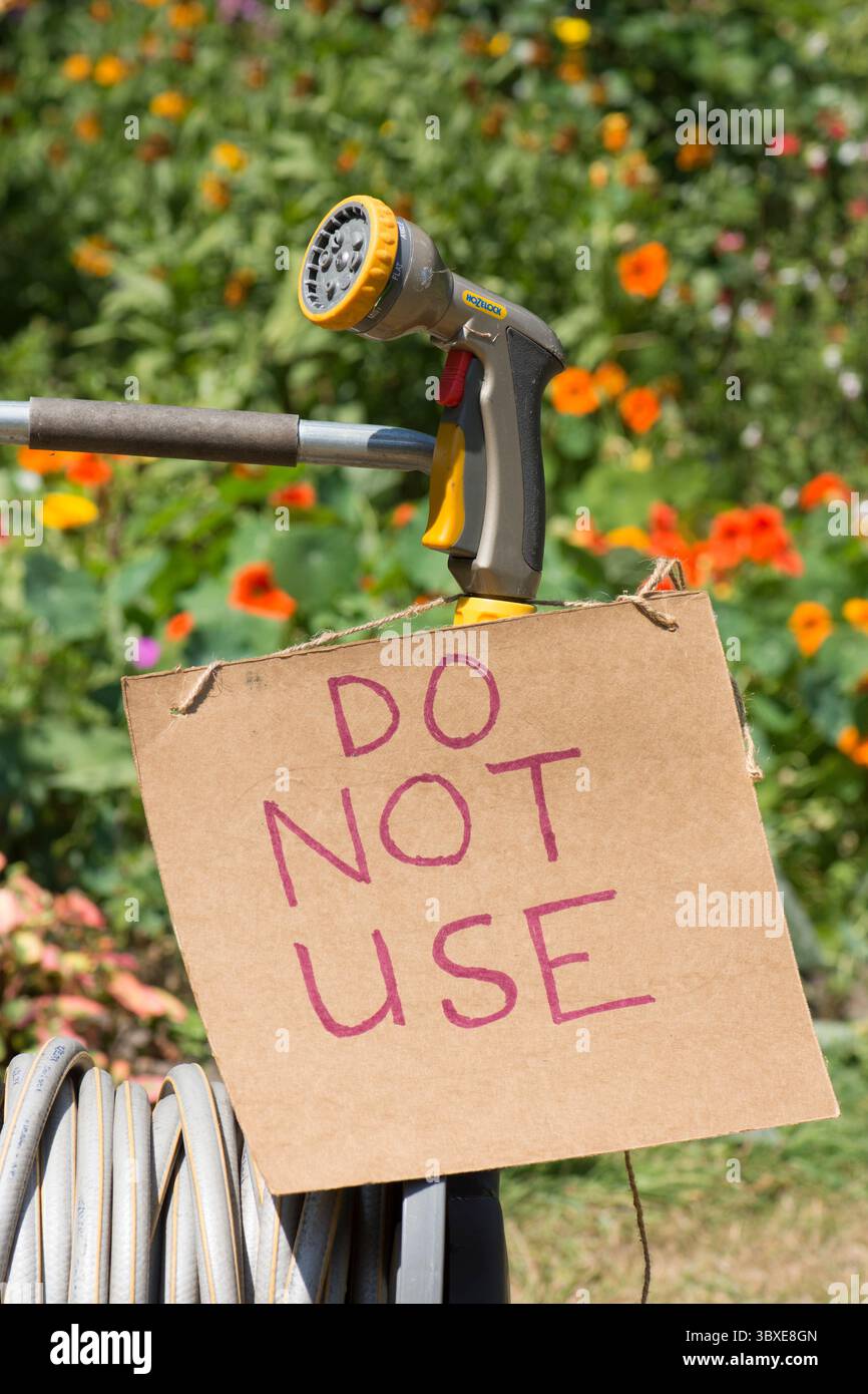 hosepipe ban warning sign, do not use sign, hose reel, water shortage ...