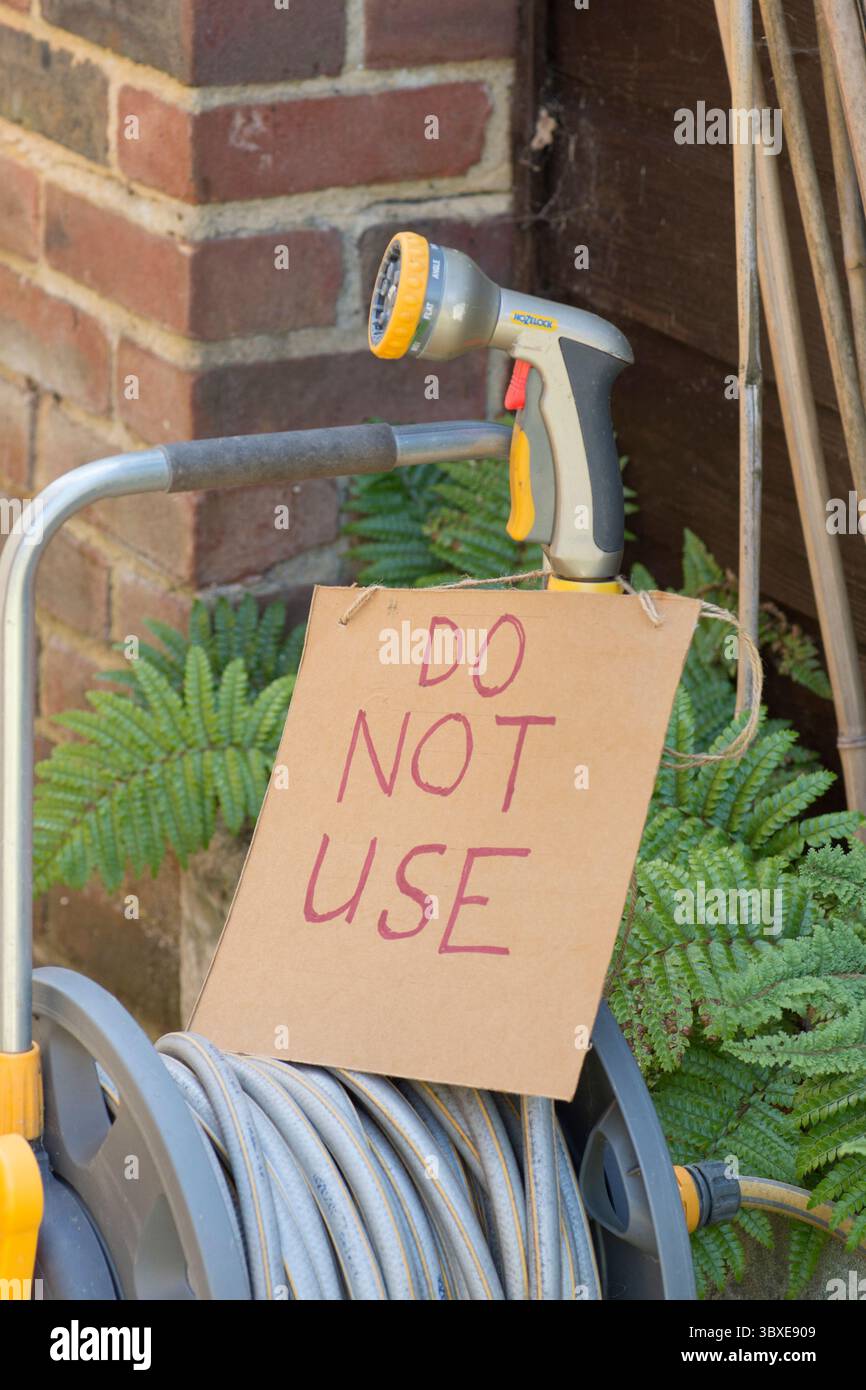 hosepipe ban warning sign, do not use sign, hose reel, water shortage ...