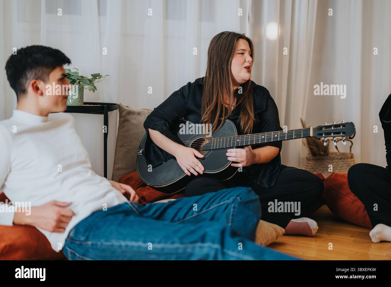 Female playing sing music relaxing hi-res stock photography and images ...