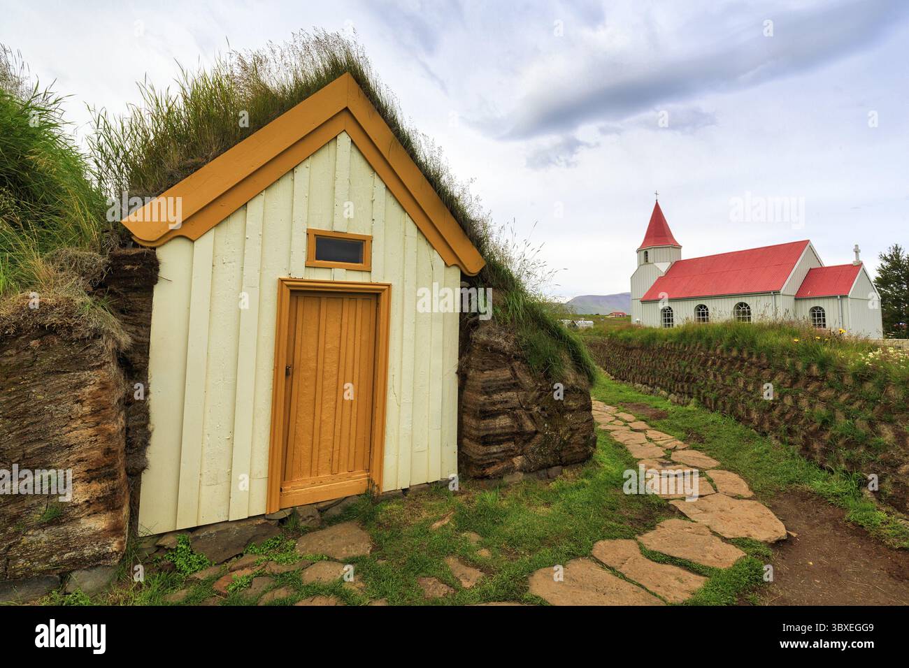 Grass sod houses and church, green roofs, peat farm or peat museum ...