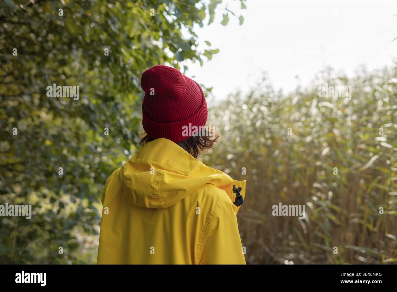 Woman in bright rain gear hi-res stock photography and images - Alamy