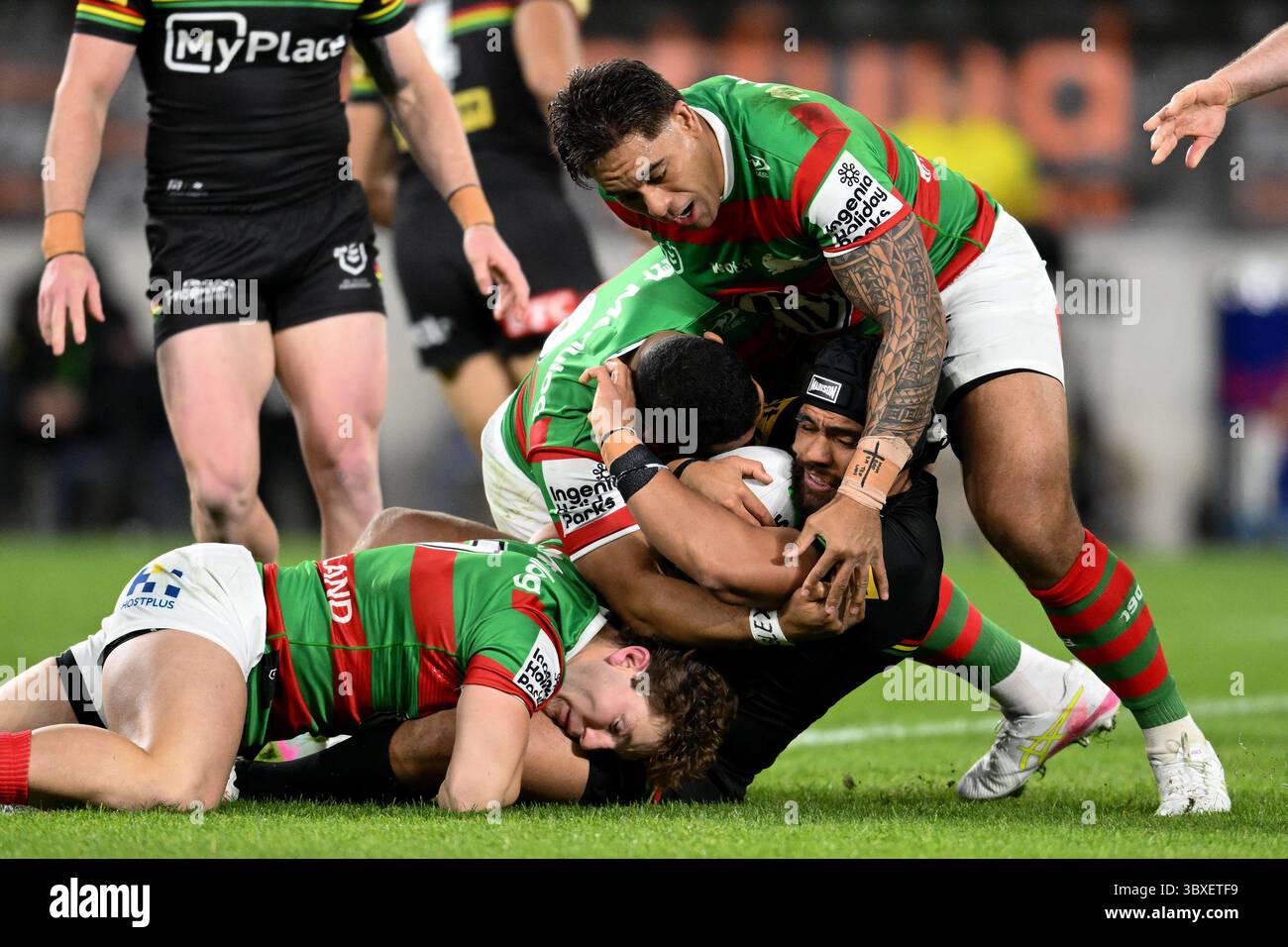 Sydney, Australia. 18th July, 2025. Isaiah Papali'i of the Panthers is tackled during the NRL ...