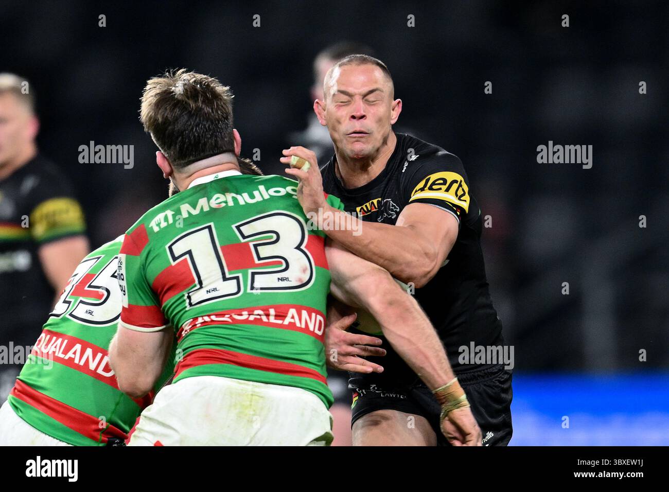 Scott Sorensen of the Panthers is tackled during the NRL Round 20 match ...