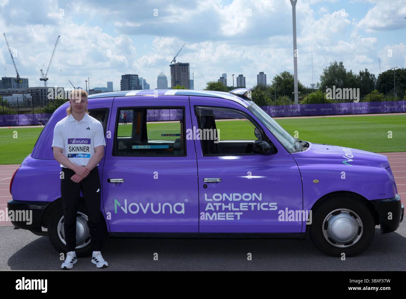 Zak Skinner (GBR) poses with taxi during London Athletics Meet press ...