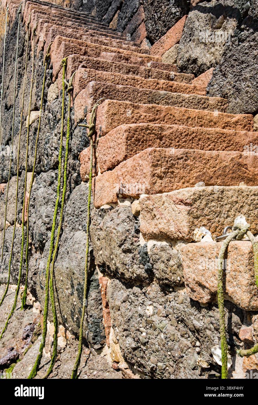 Harbour wall and steps up to jetty rozel hi-res stock photography and ...