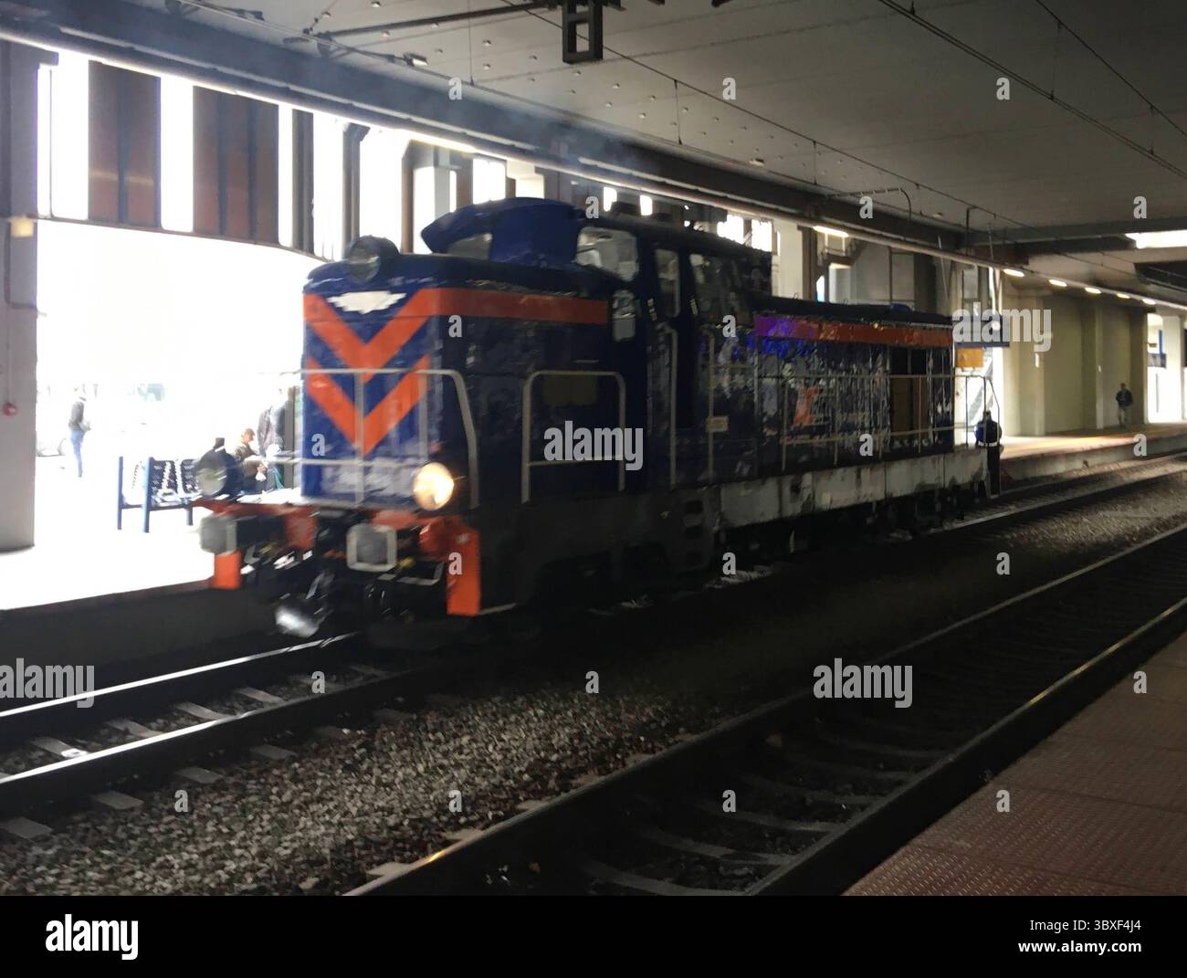 Poznań city station capturing locomotives, platforms, tracks, and ...