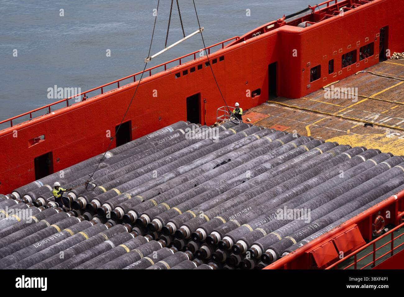 NORTH SEA - A piece of pipe is lifted aboard pipelay in the North Sea ...