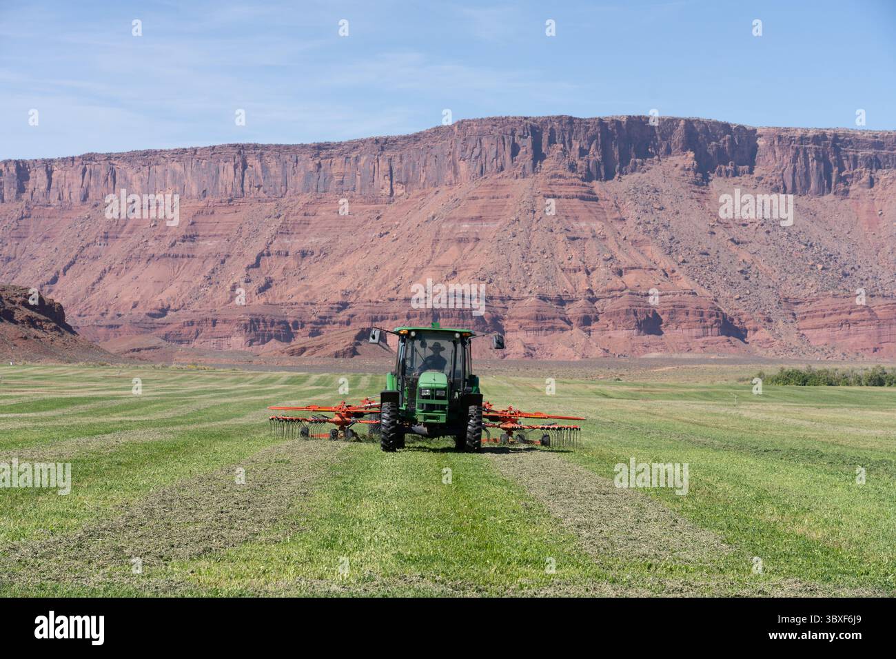October 4, 2021, Moab, Utah, United States: A rancher runs a rotary hay ...