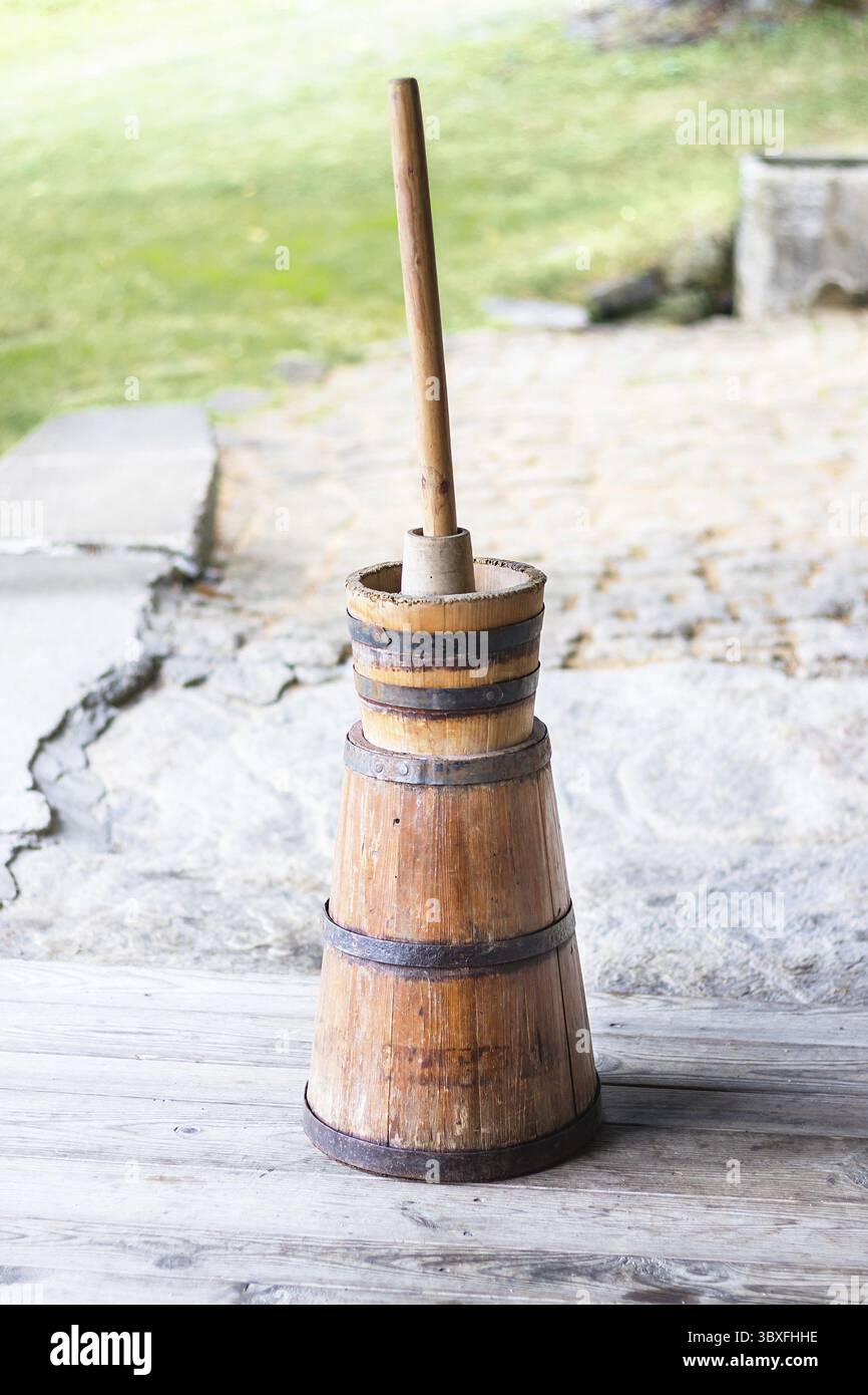 Butter churn - old traditional wooden plunger-type butter churn with ...