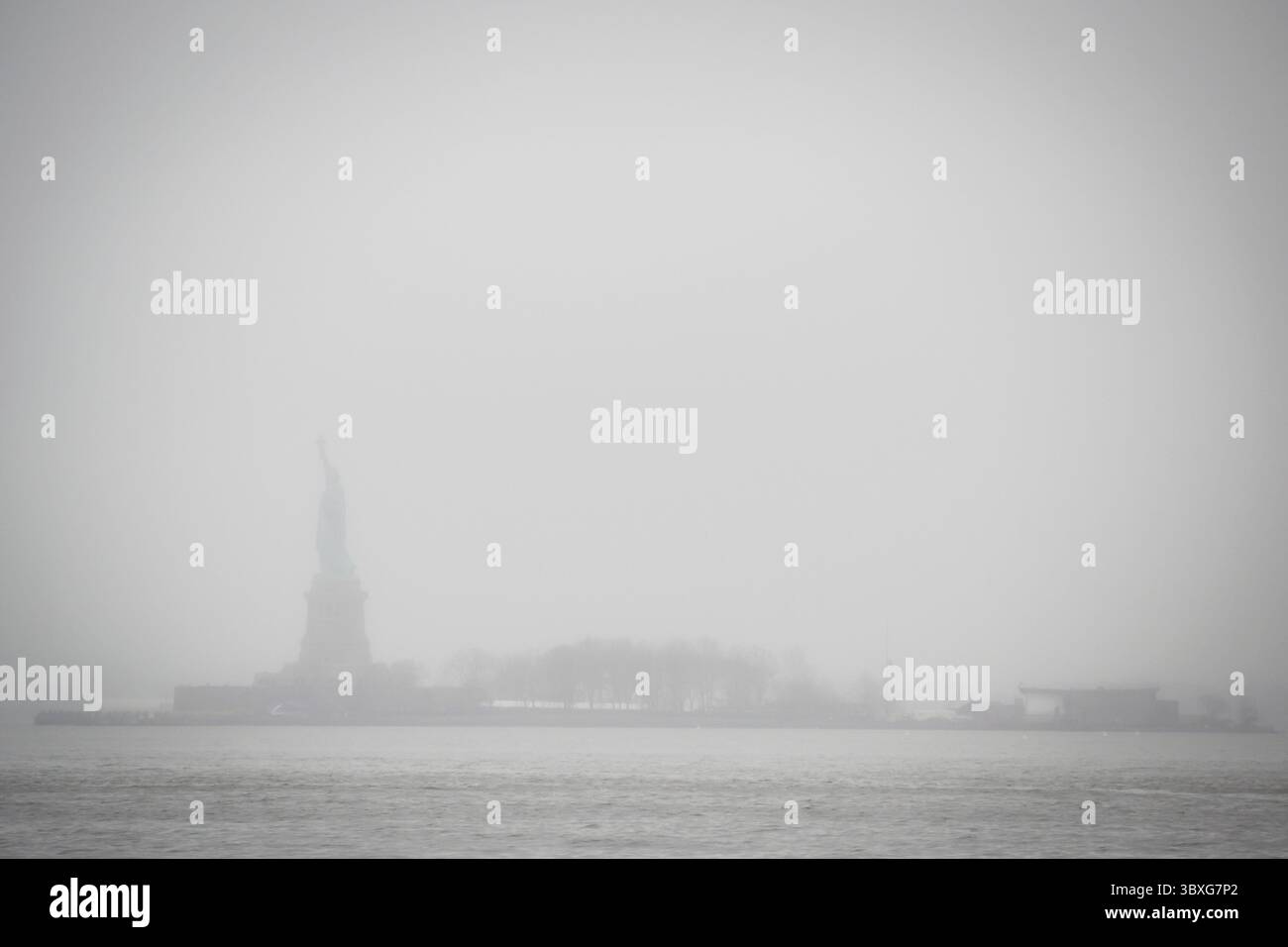 The Statue of Liberty Lost in the New York Mist of the Hudson River ...