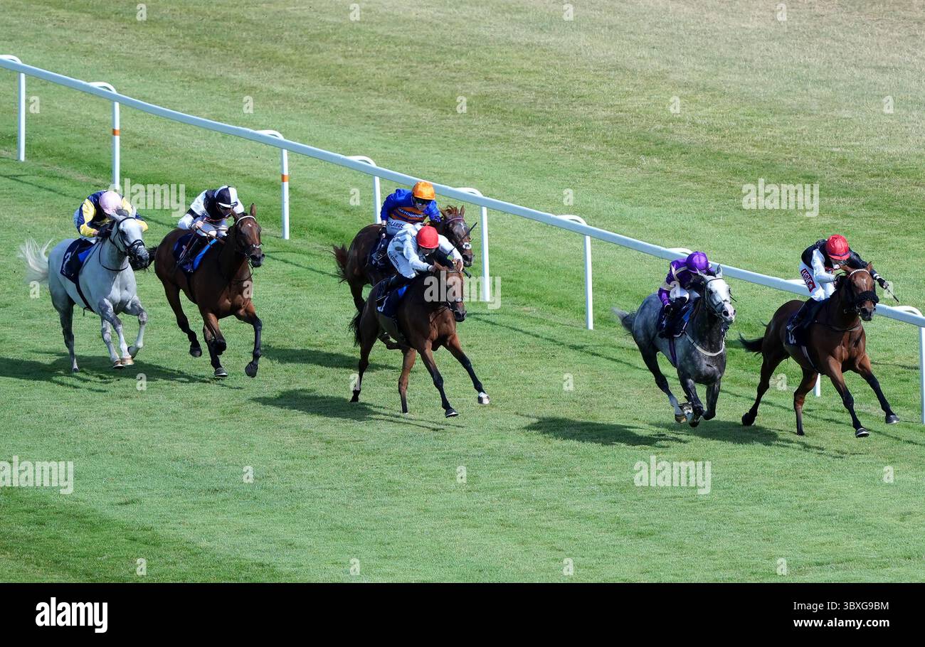 Star Of Light ridden by Tyler Heard (right) on their way to winning the ...