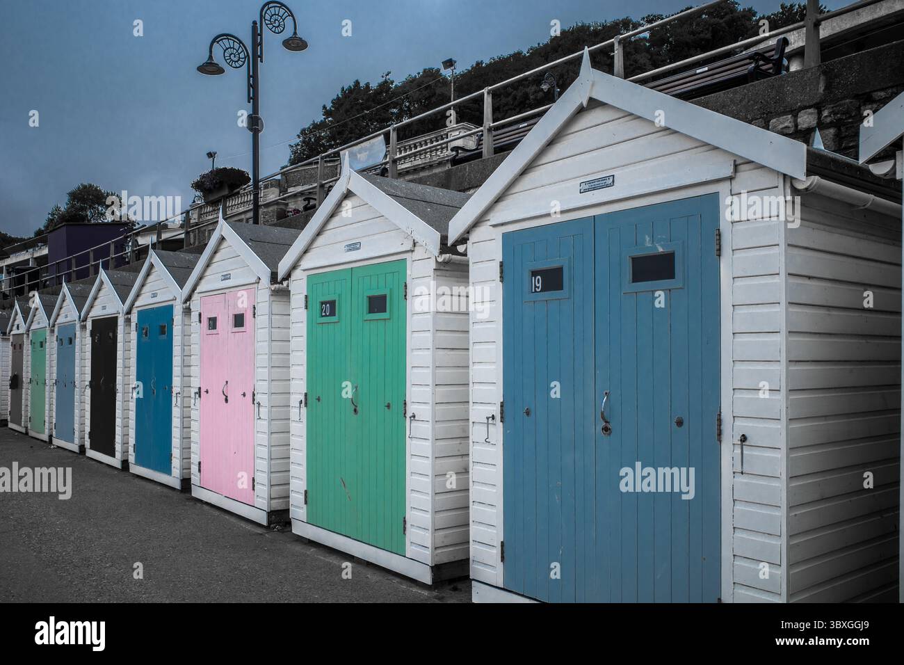 Colourful Coastal Beach Huts in Lyme Regis, Dorset on a cloudy Summer ...