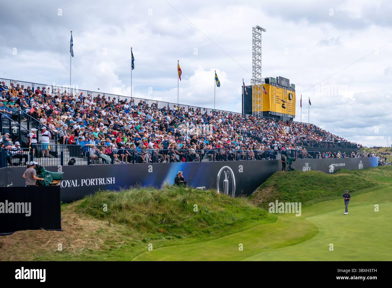 Portrush, Ireland. 18th July 2025. Full grandstands the 18th green ...