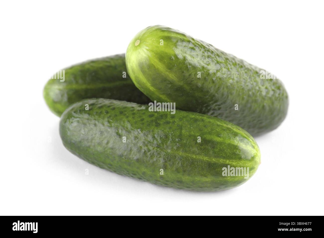 Pile of fresh salted gherkins, close up, isolated Stock Photo - Alamy