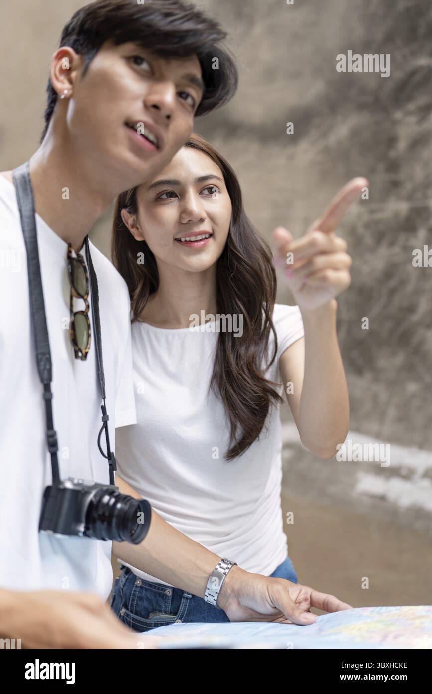 Couple navigates travel adventure hi-res stock photography and images ...