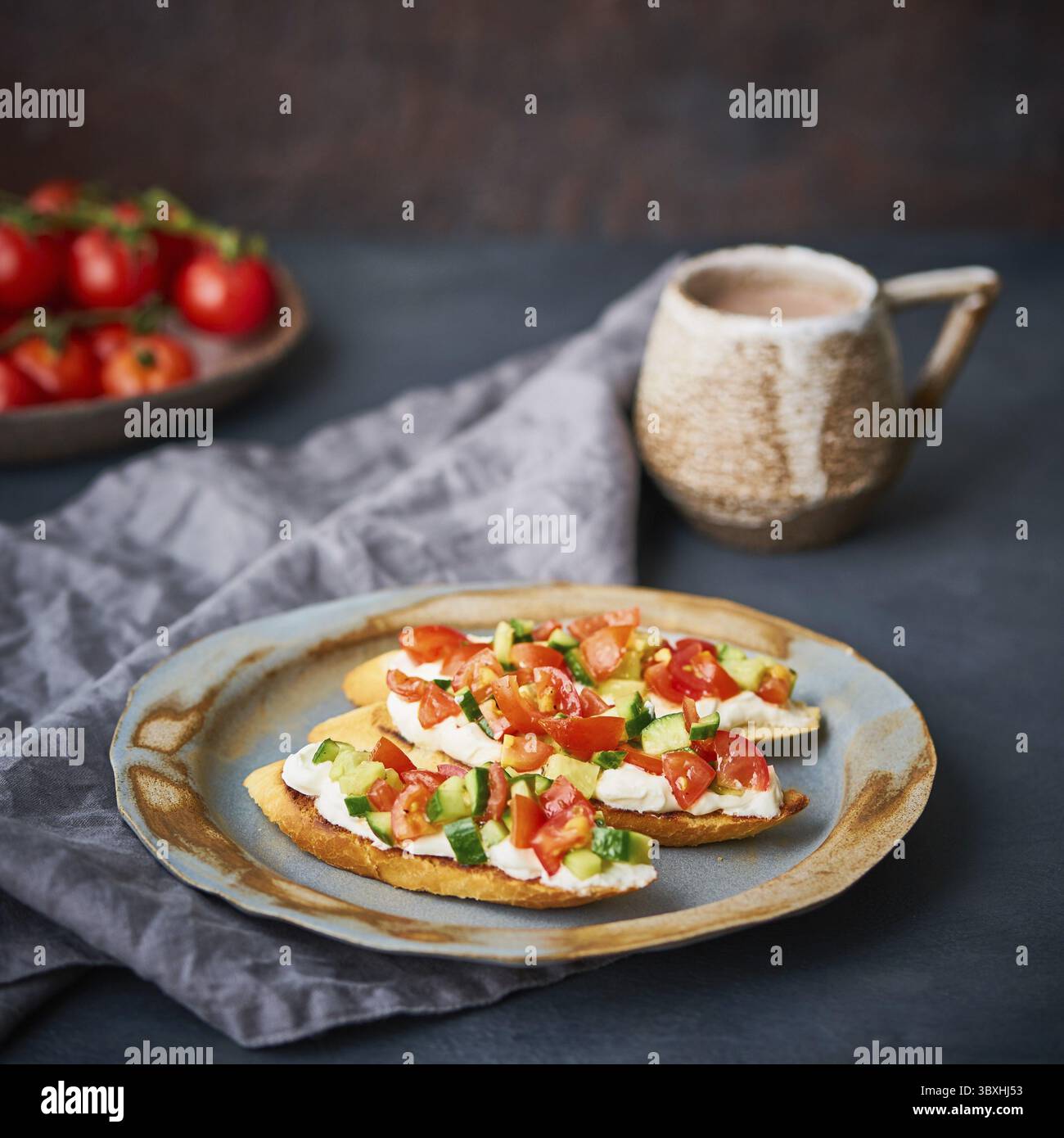 Three crostini, traditional Italian sandwich with tomatoes and ...