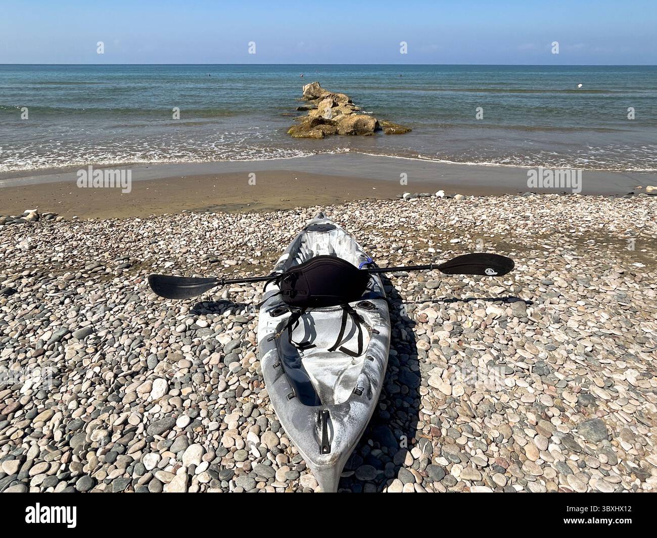 Kayaking at Agios Ermogenis Kourion beach Stock Photo - Alamy