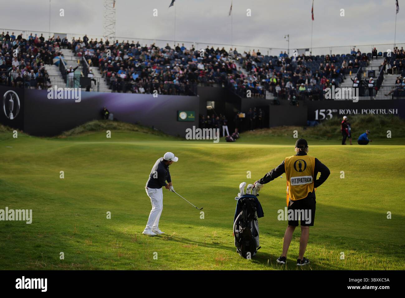 Matt Fitzpatrick of England putt on the 18th green during the second ...
