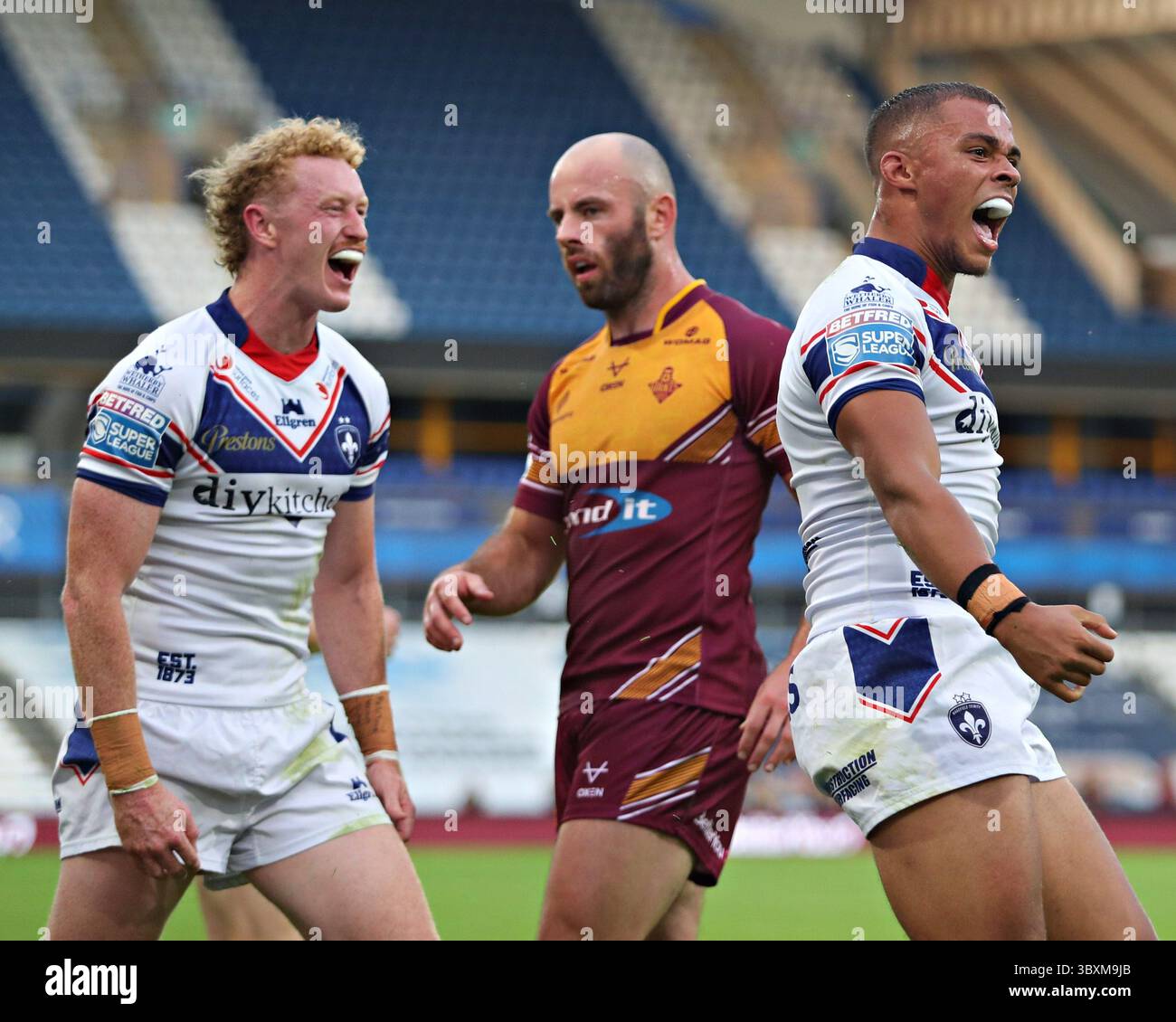 Corey Hall of Wakefield Trinity celebrates his try during the Betfred ...
