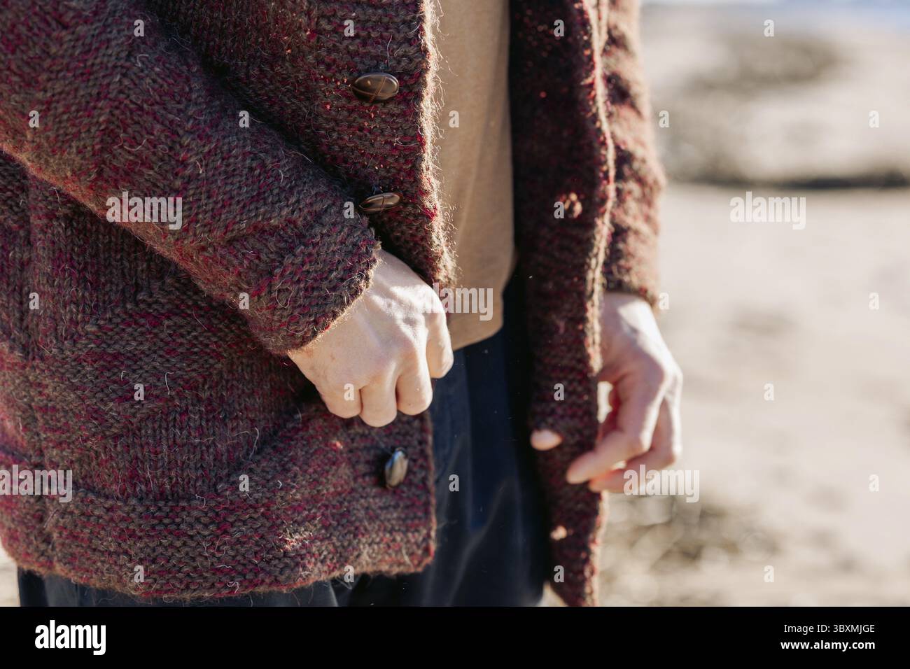 Male hands close-up. Young carefree couple in love throwing pebbles ...
